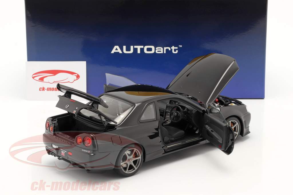 AUTOart 1:18 Nissan Skyline GT-R (R34) V-Spec II Année de construction 2001 perle noire 77407 ...