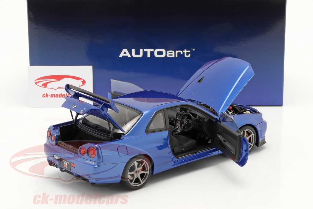 AUTOart 1:18 Nissan Skyline GT-R (R34) V-Spec II Byggeår 2001 bayside blå 77408 model bil 77408 ...