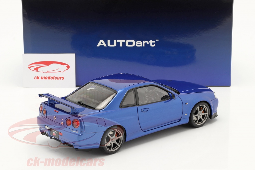 AUTOart 1:18 Nissan Skyline GT-R (R34) V-Spec II Byggeår 2001 bayside blå 77408 model bil 77408 ...