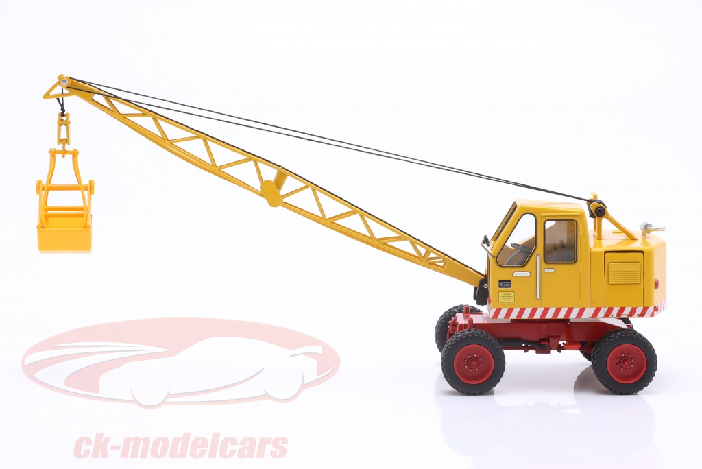 Schuco 1:32 Fuchs graafmachine 301 met schep En sloopkogel geel ...