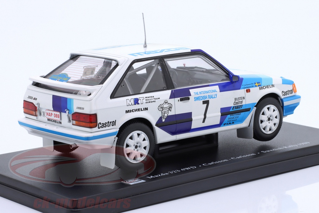 Altaya 1:24 Mazda 323 4WD #7 winner rally Sweden 1989 I. Carlsson, P ...