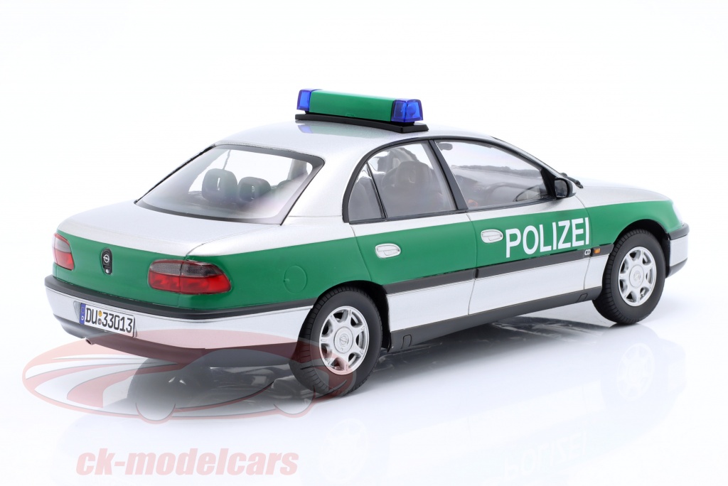 Triple9 1:18 Opel Omega B police Germany year 1996 silver / green T9 ...