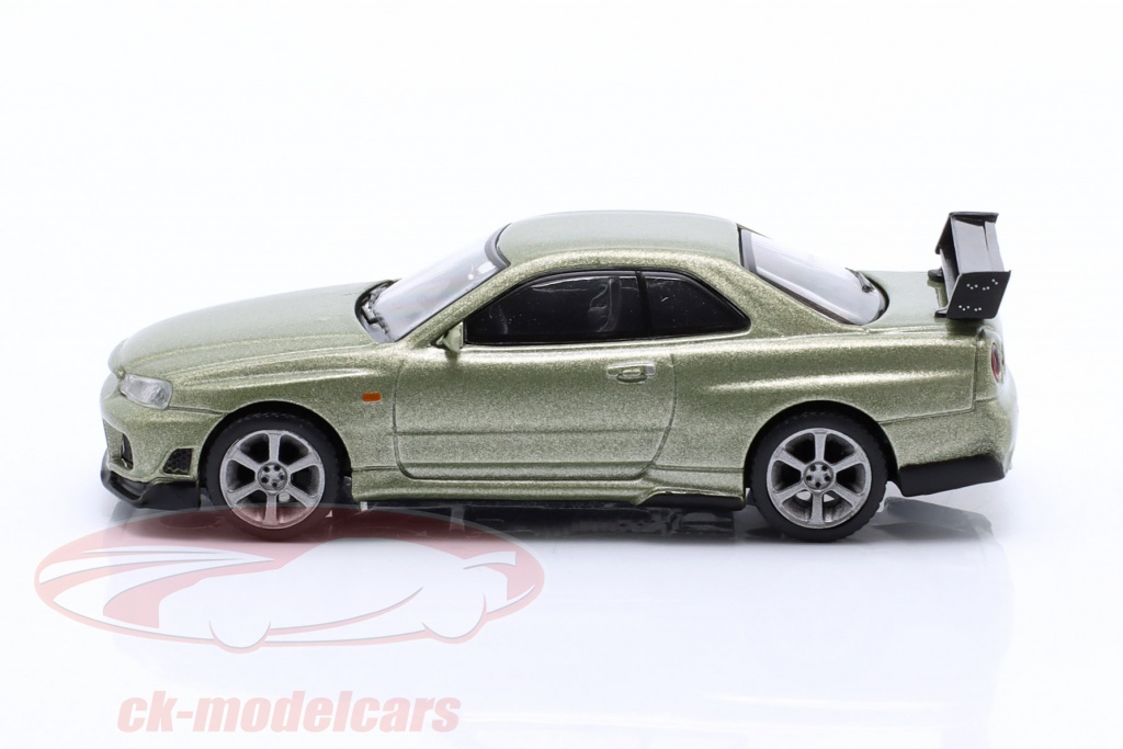 True Scale 1:64 Nissan Skyline GT-R (R34) Tommy Kaira millenium jade MGT00697R Modellauto ...